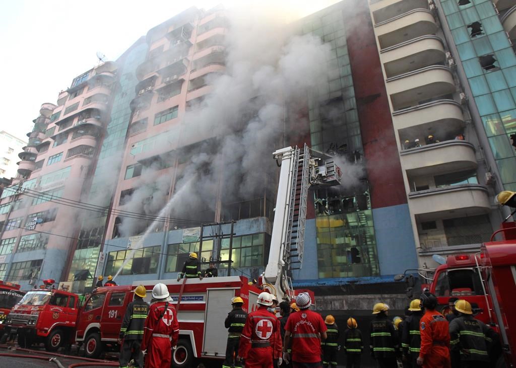Myanmar firefighters extinguish blaze at high-rise in Yangon