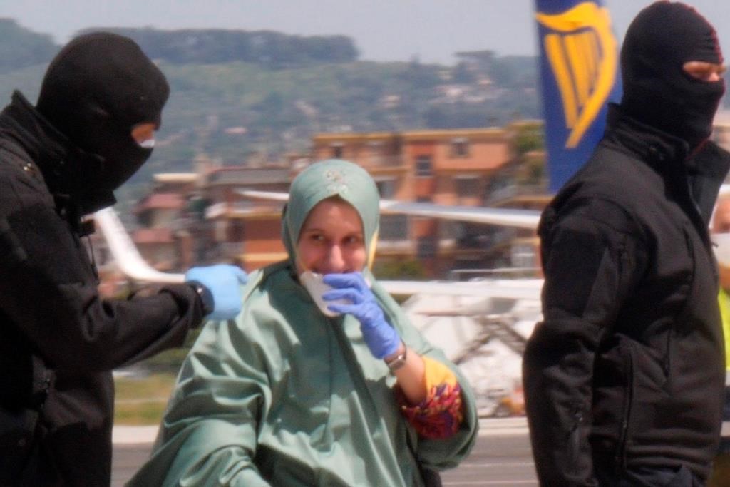 Italian woman returns home after 18-month African kidnapping