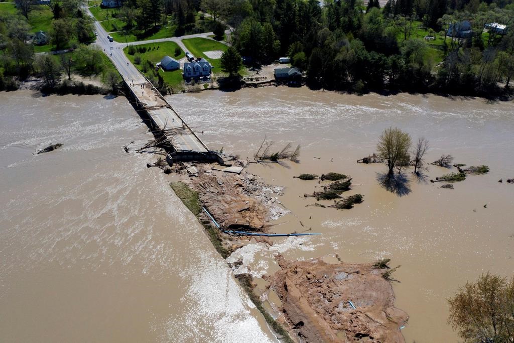Amid cleanup, flooding in Michigan prompts more evacuations