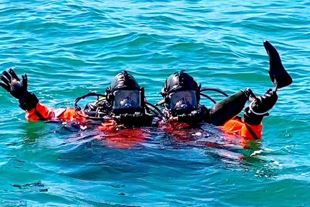 Divers pull Paralympic hopeful's prosthetic from ocean floor
