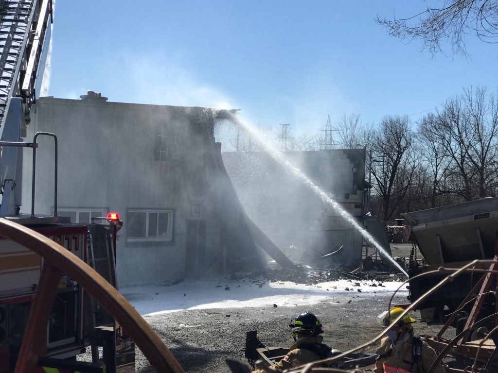 Crews respond to large fire near QEW in Burlington