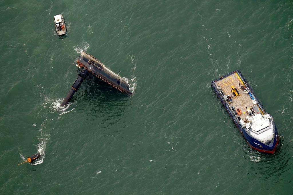 Offshore lift boat flipped while lowering legs, turning