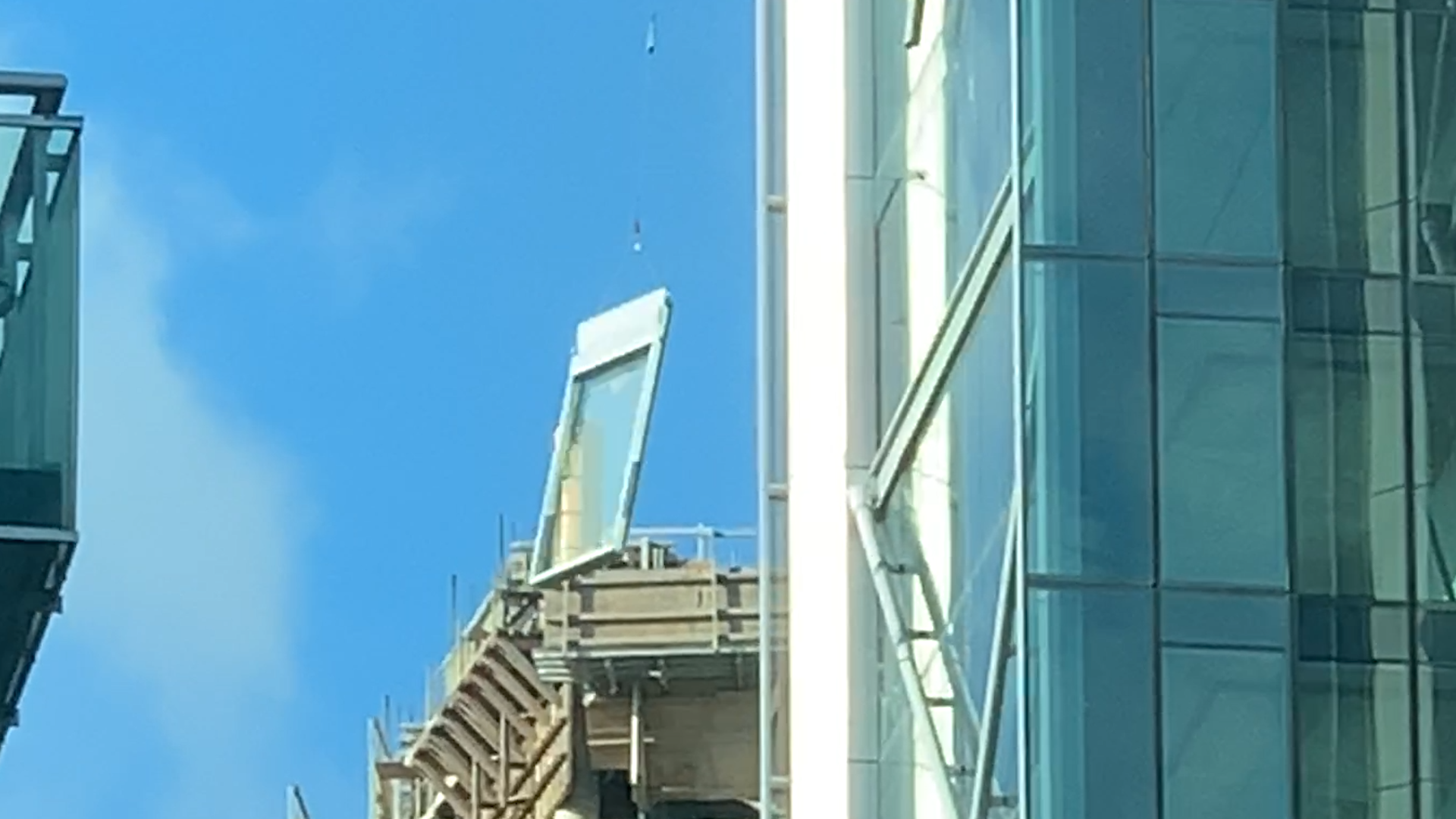Person injured after glass falls from downtown condo under construction