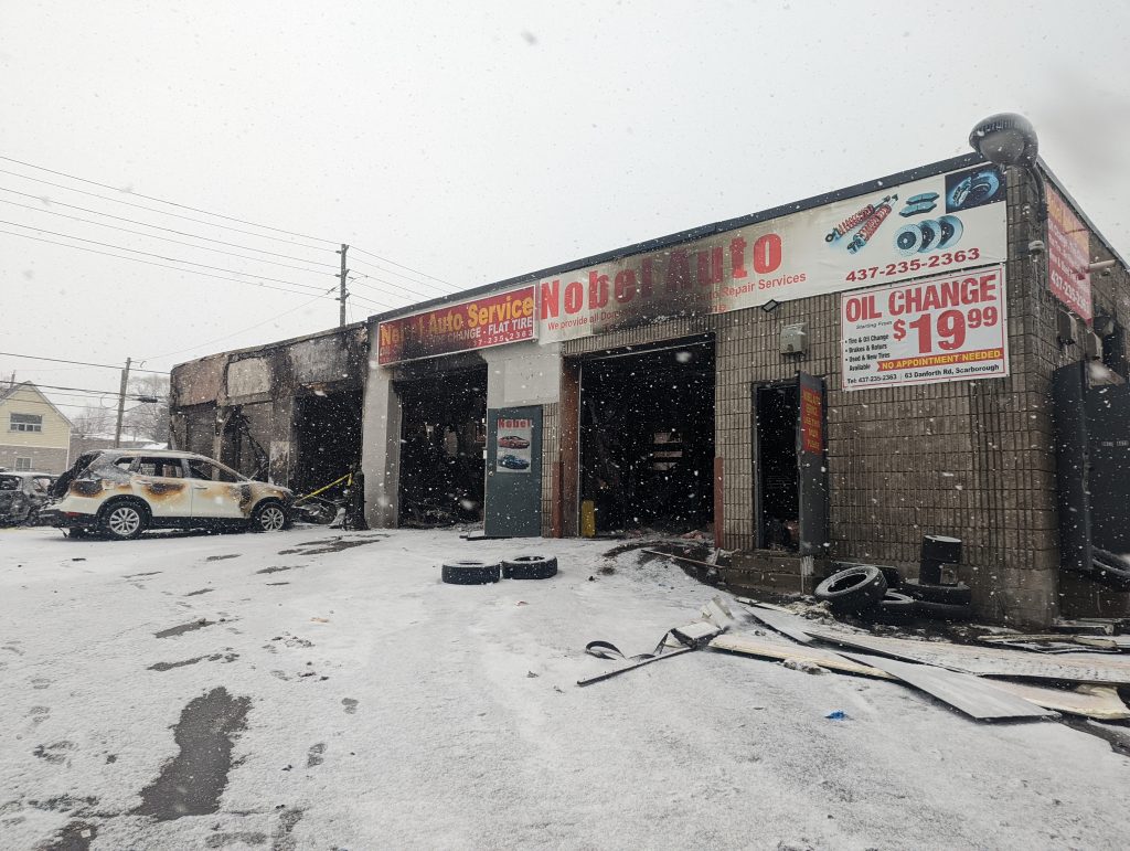 Two people injured after three alarm fire at Scarborough auto shop
