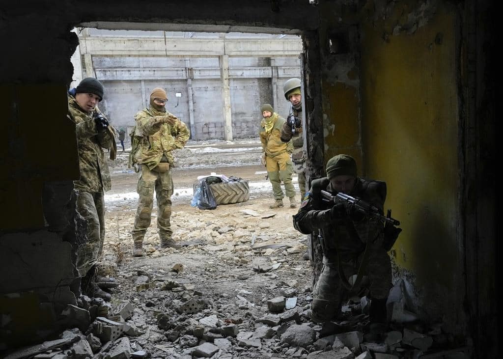 Foreign fighters in Ukraine await weapons in chaos of war
