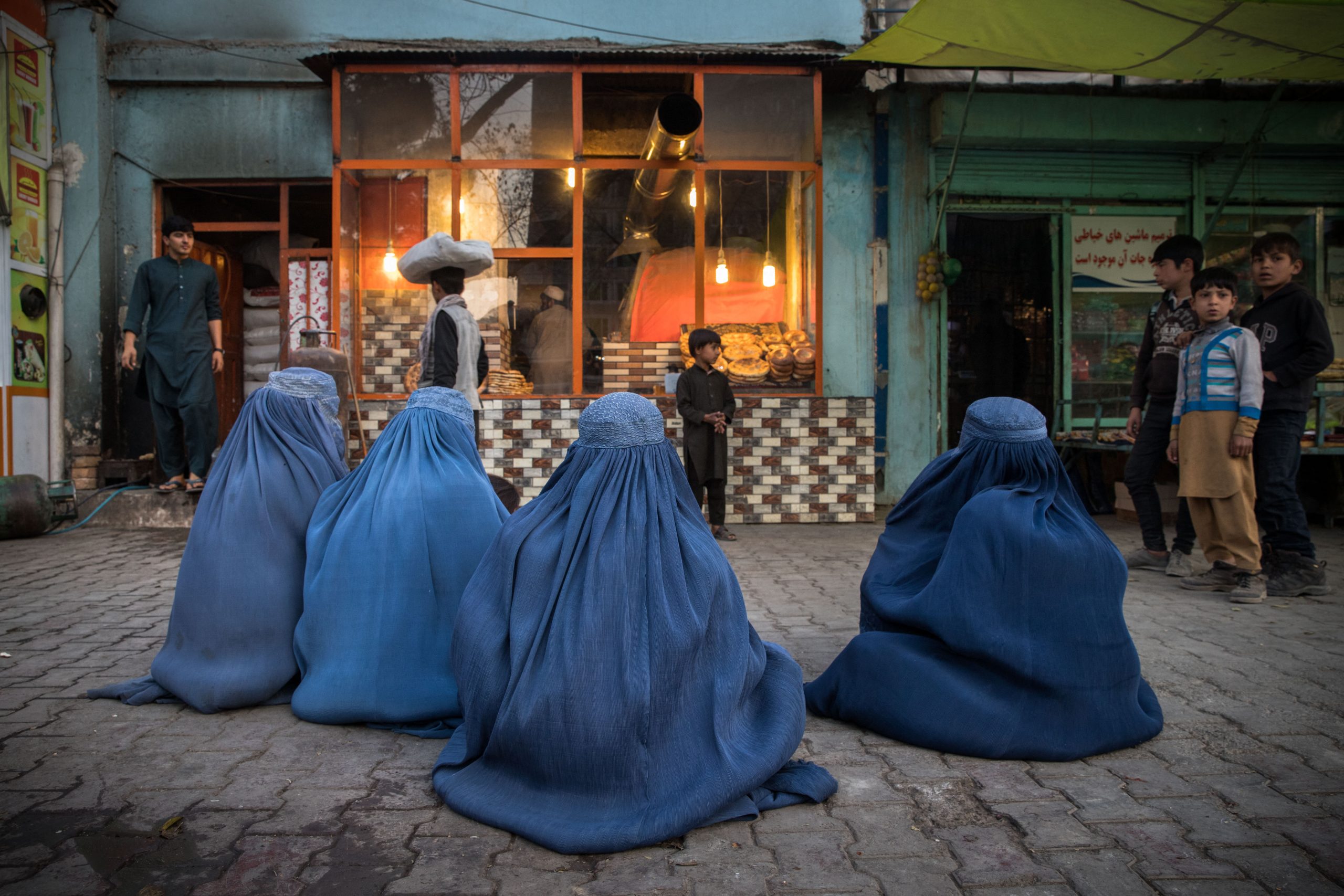 Afghanistan's Taliban order women to wear burqa in public