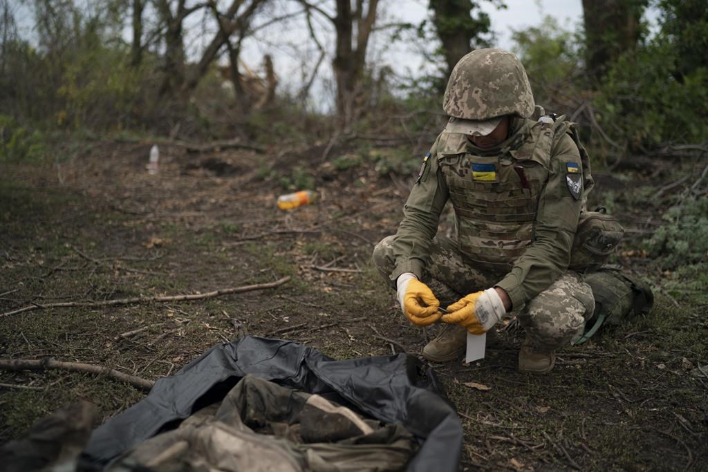 Near the Russian border, bodies still lie on the battlefield