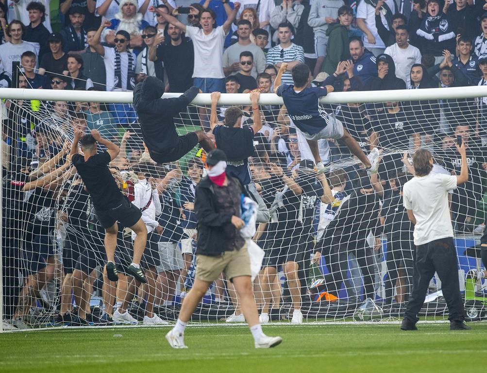 More charges filed after violent pitch invasion in Australia