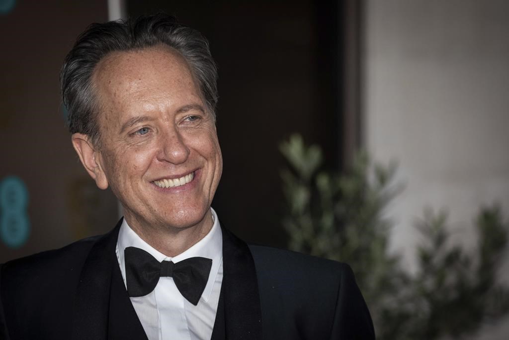 Richard E. Grant brings enthusiasm as BAFTA Film Awards host