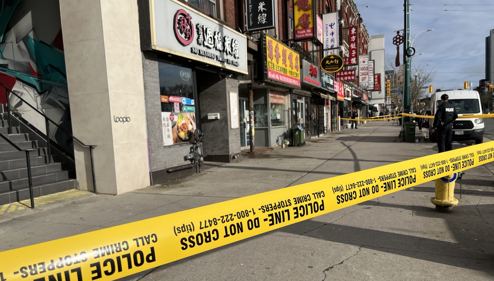 Two men stabbed during fight in Chinatown; suspect in custody