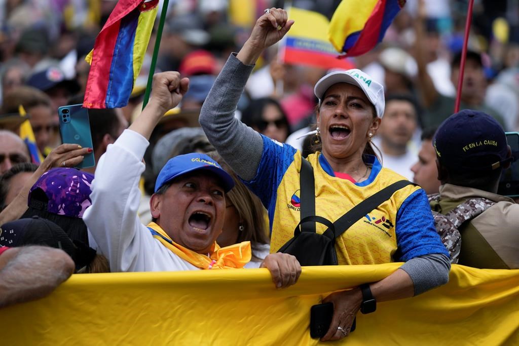 Thousands take to the streets in Colombia to protest leftist government ...