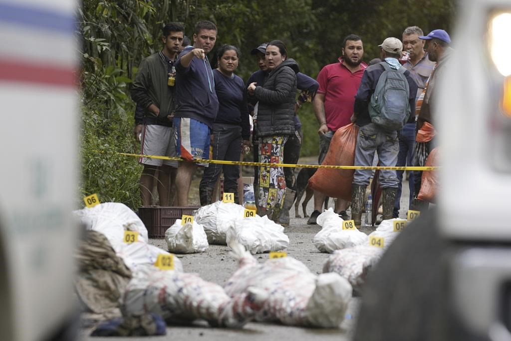 A mudslide in Colombia kills at least 14 people and blocks a crucial ...