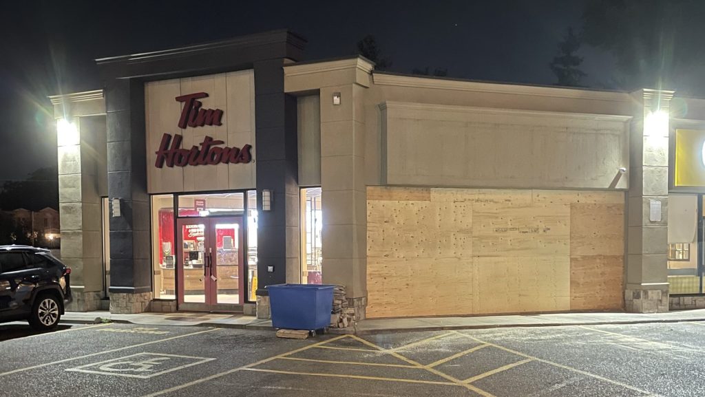 Car crashes through Tim Horton's window in East York