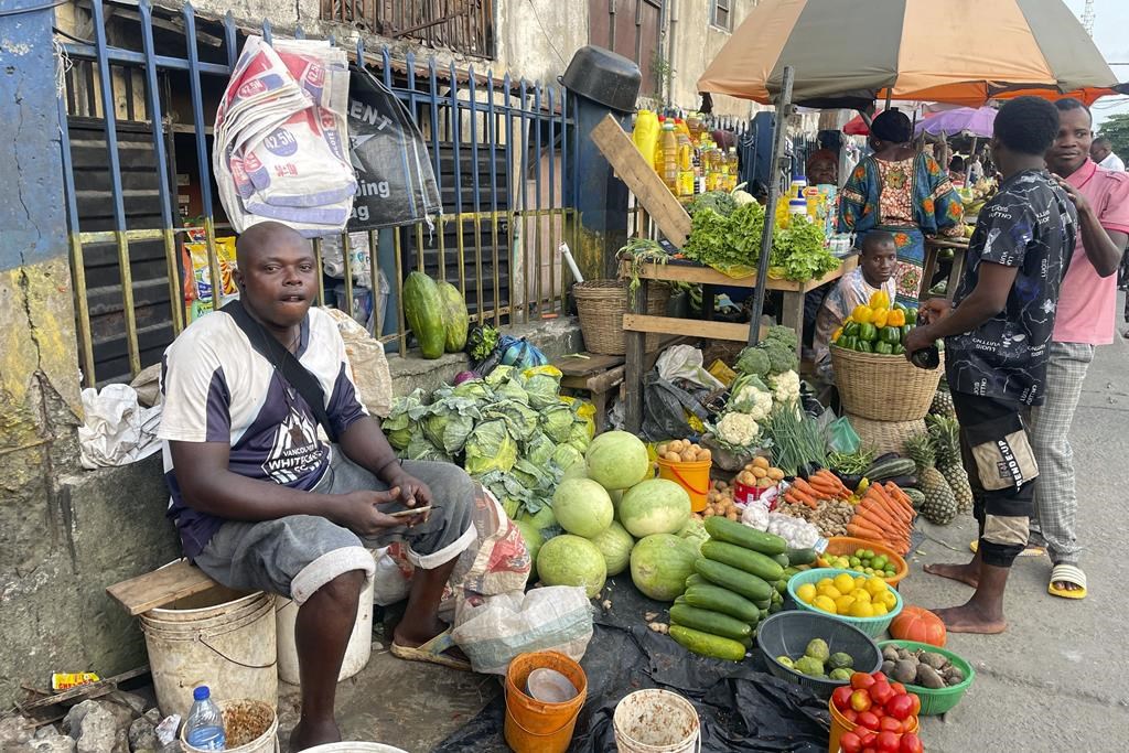 Nigeria's leader presents a $34 billion spending plan that prioritizes ...