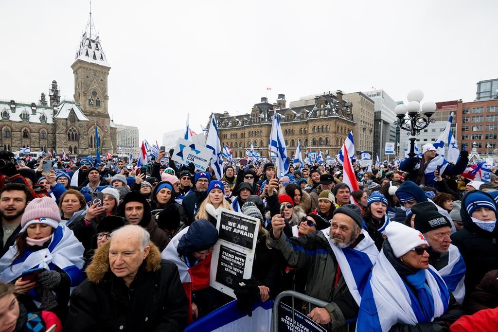 Family of suspected hostage, Jewish groups and MPs rally on Hill ...