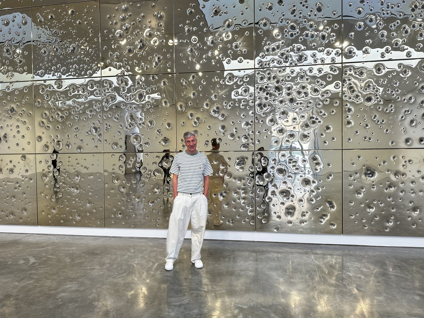 Gold and gunfire: Italian artist Cattelan's latest satirical work is a ...