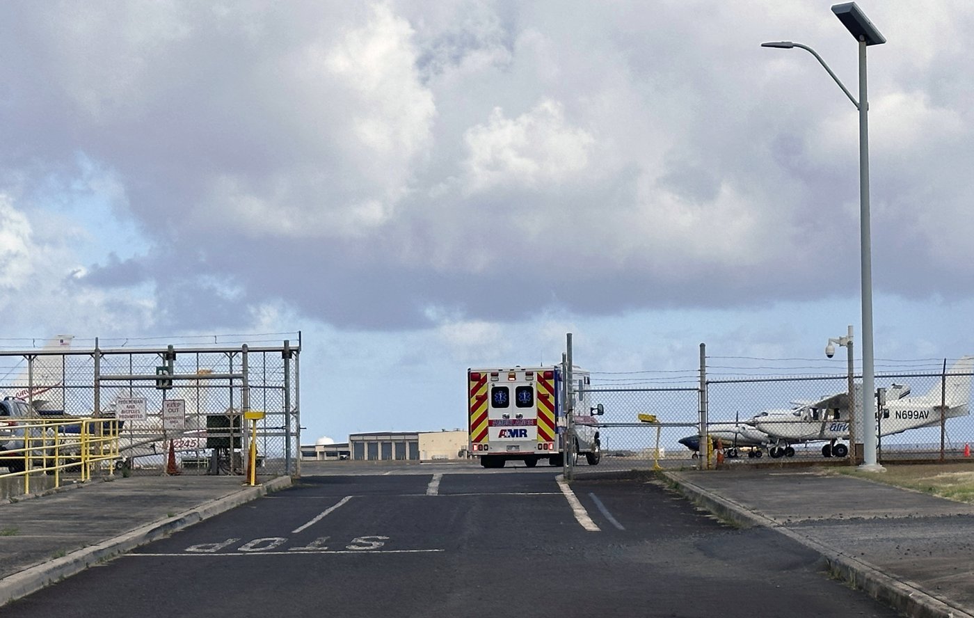 Search suspended for pilot and passenger after tour helicopter crash ...