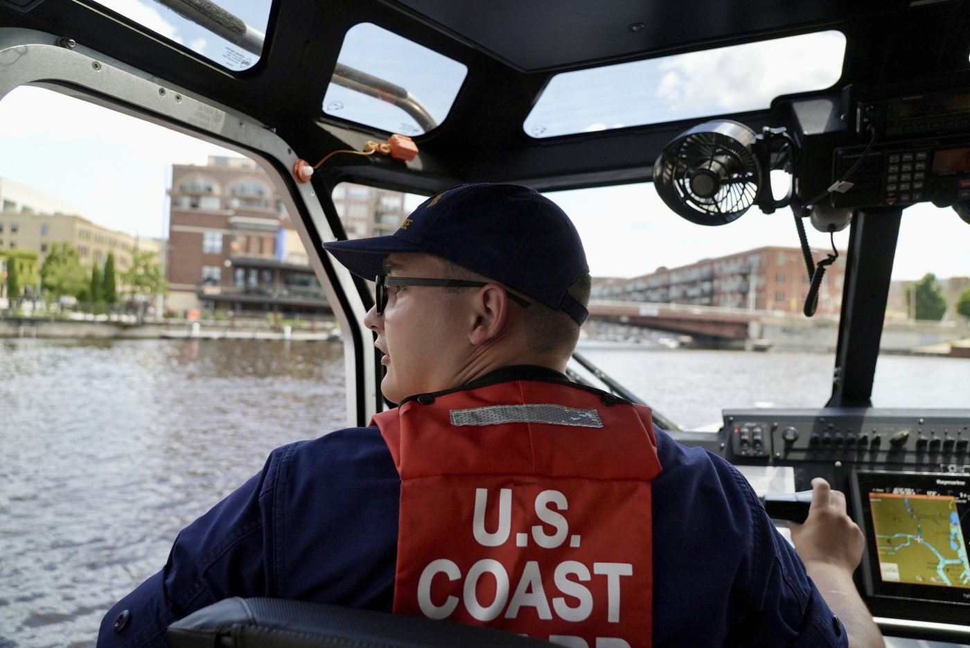 Heavily armed security boats patrol winding Milwaukee River during GOP ...