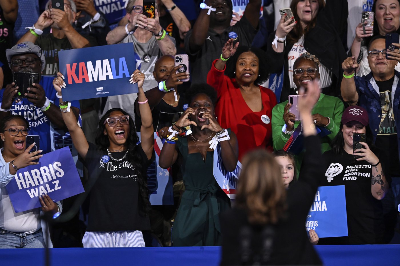 Harris promoting her resume rather than race as she courts voters