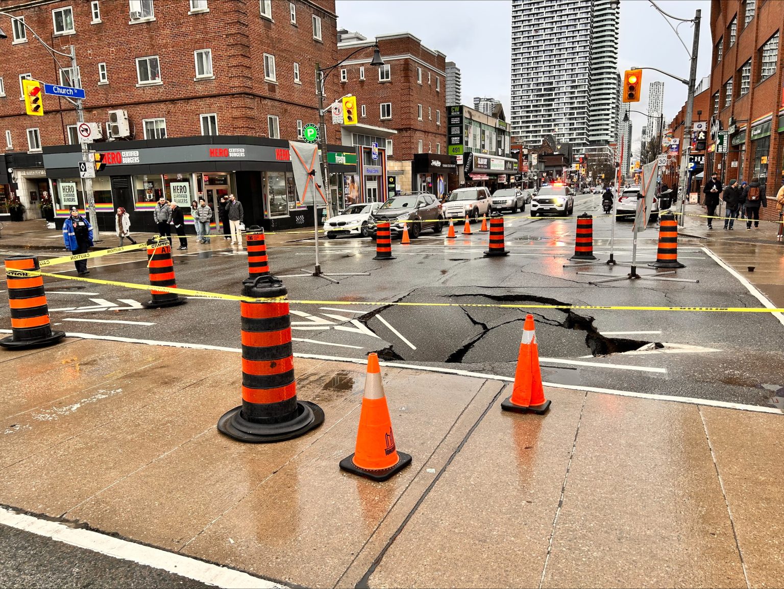 Large sinkhole disrupts traffic at Church-Wellesley intersection