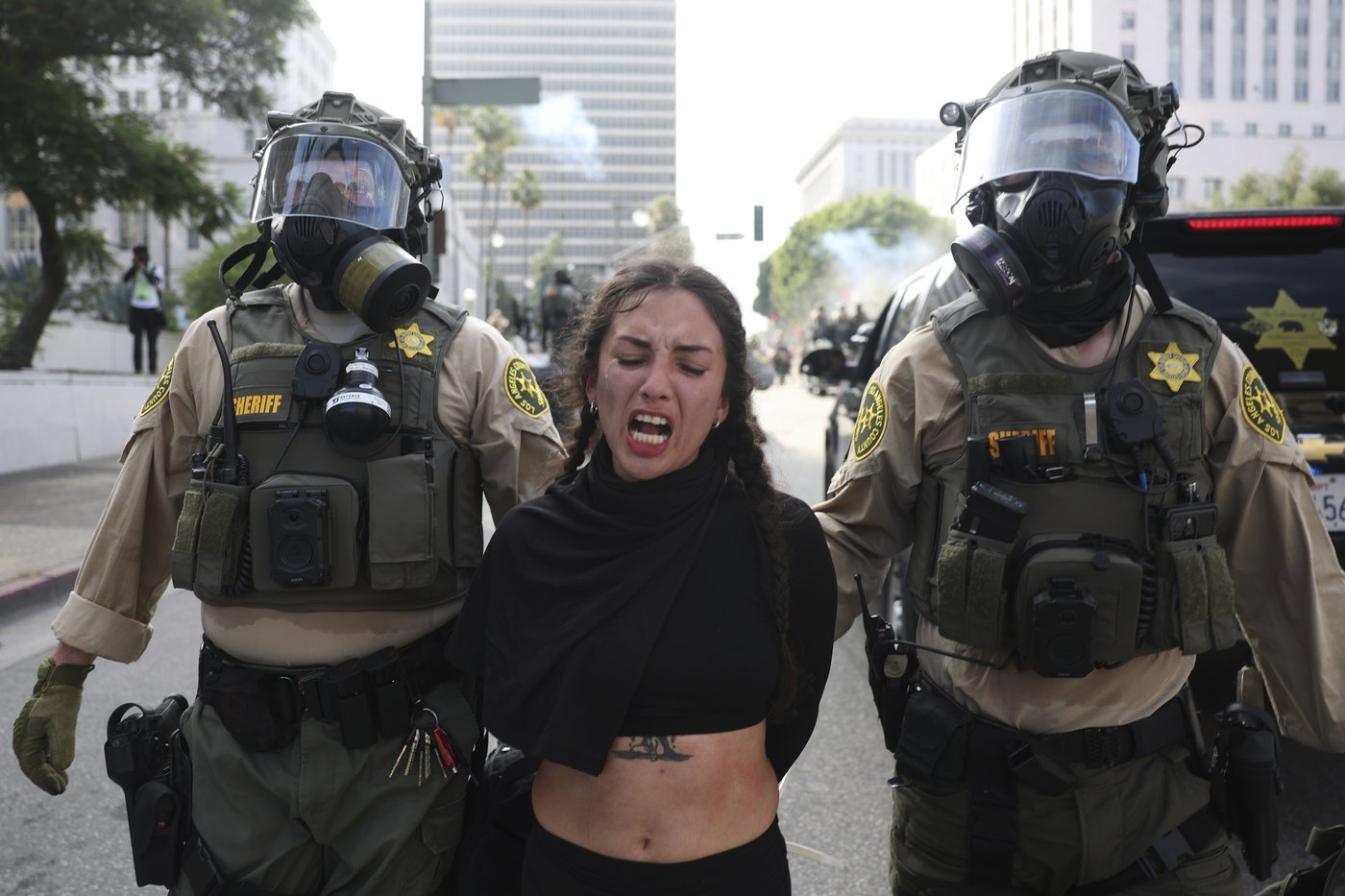 What to know about debate over protesters and ICE agents wearing masks ...