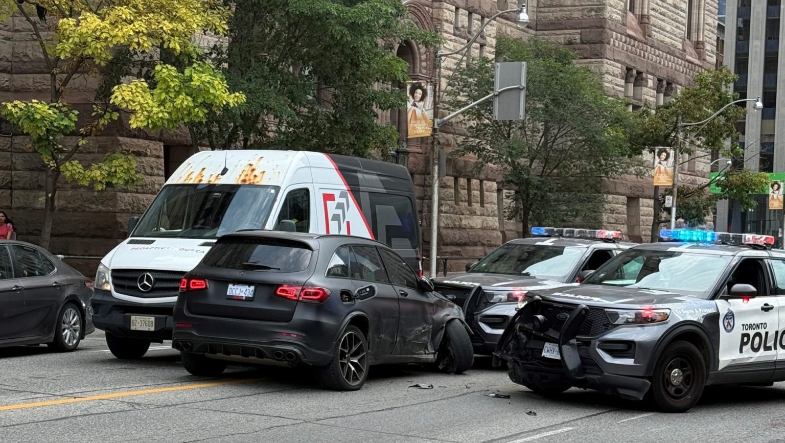 Toronto police cruiser hit head-on as vehicle strikes multiple parked ...